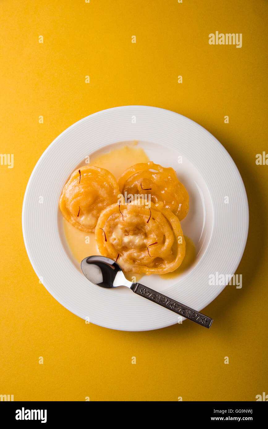 jilbi or jalebi or imarati with rabdi made from condensing milk, famous ...