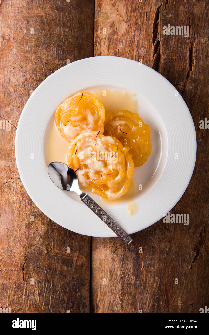 jilbi or jalebi or imarati with rabdi made from condensing milk, famous ...