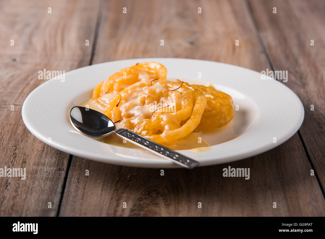 jilbi or jalebi or imarati with rabdi made from condensing milk, famous ...