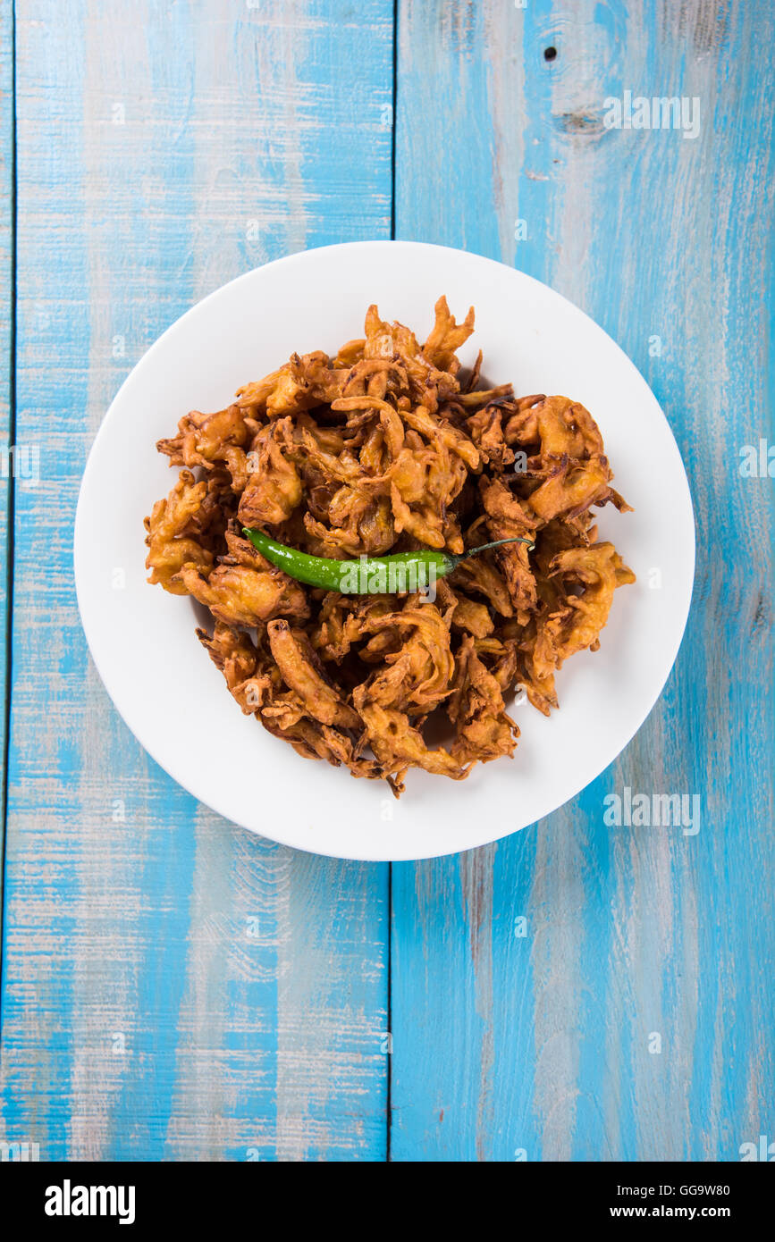 Crispy onion bhaji or kanda bhaji or fried onion pakore or pakode ...