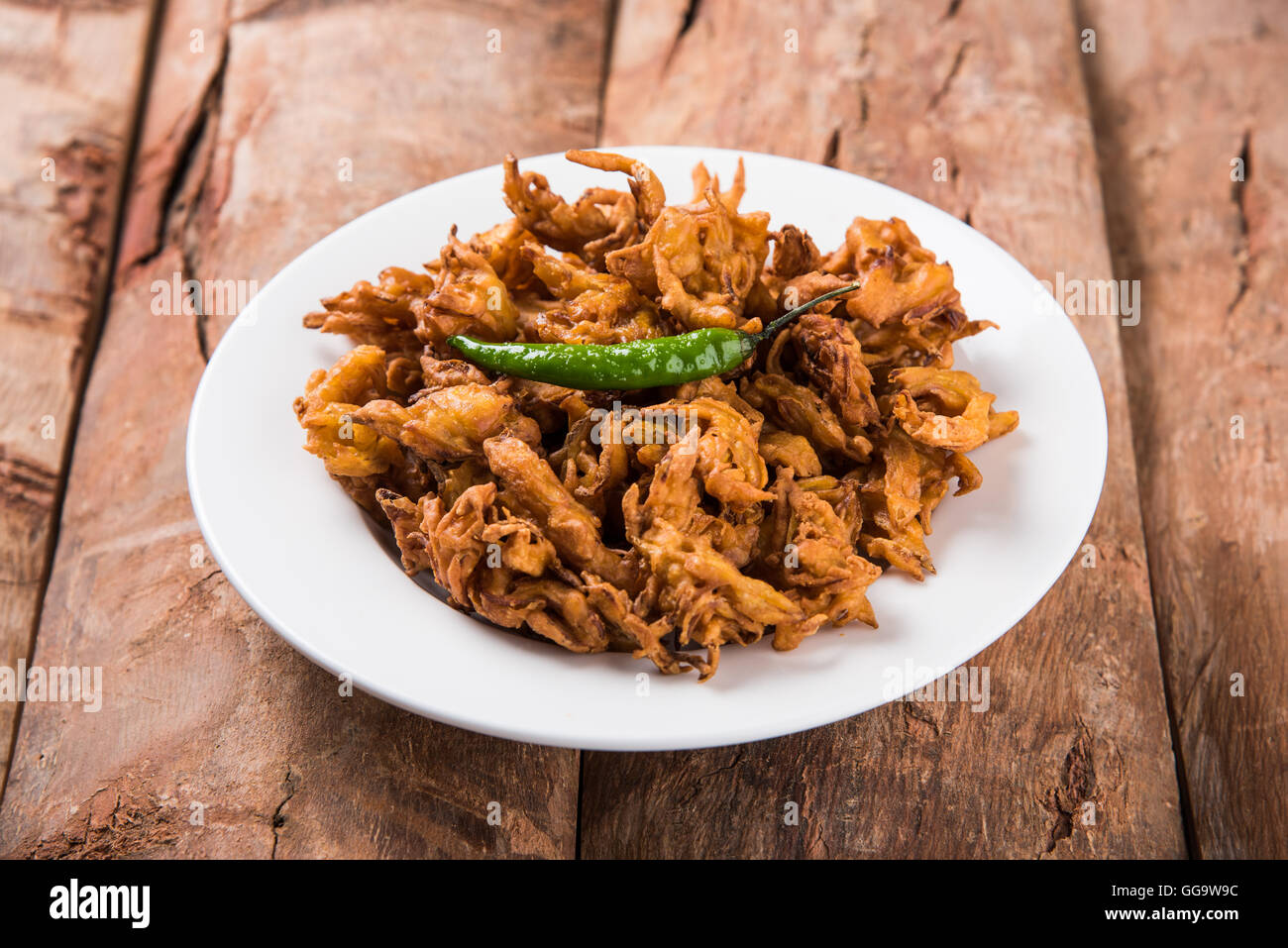 Crispy onion bhaji or kanda bhaji or fried onion pakore or pakode ...