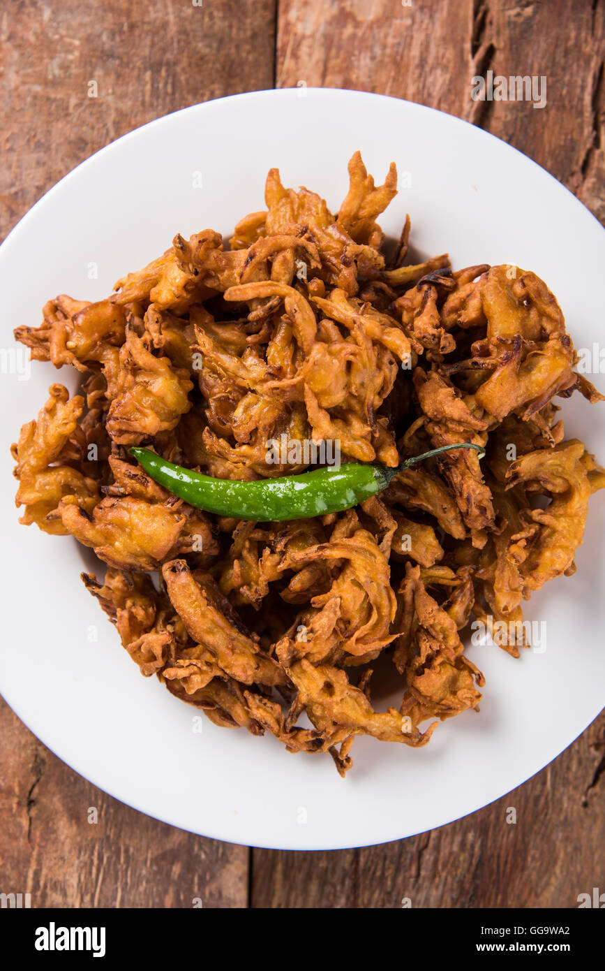 Crispy onion bhaji or kanda bhaji or fried onion pakore or pakode ...