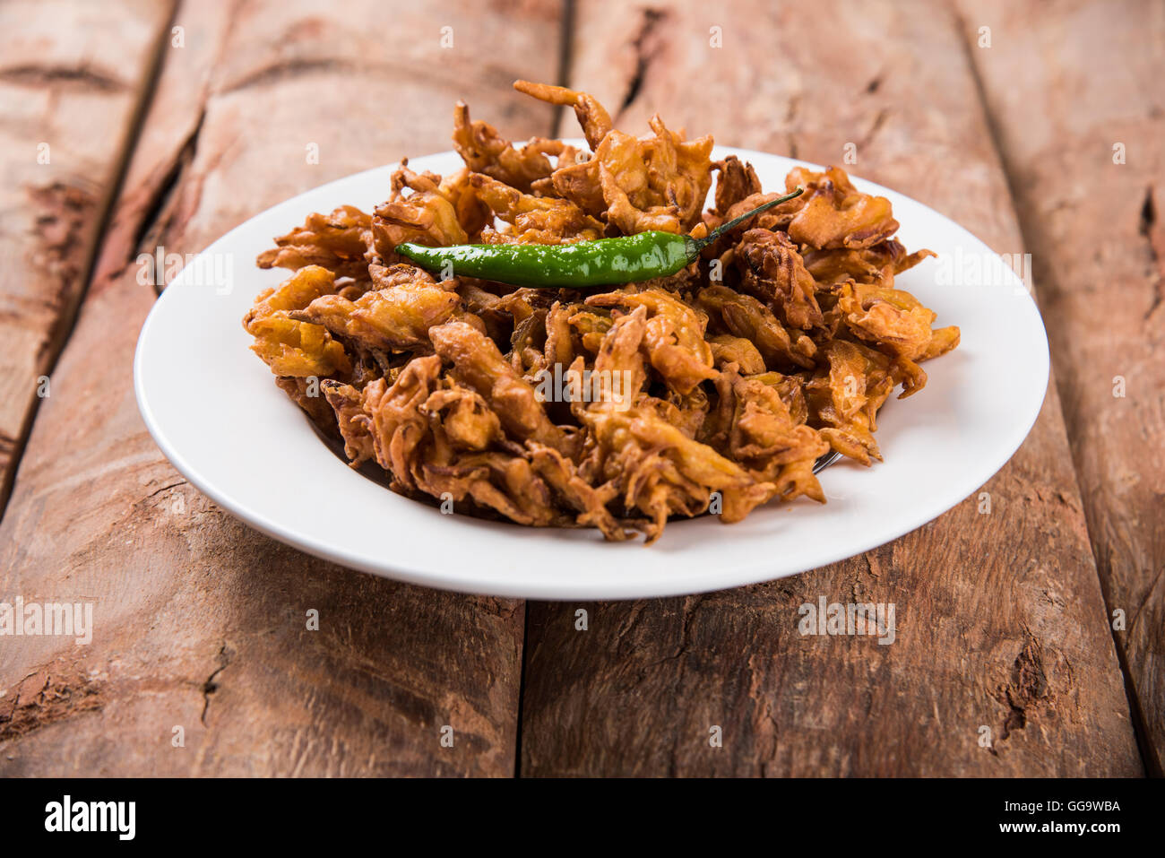 Crispy onion bhaji or kanda bhaji or fried onion pakore or pakode ...
