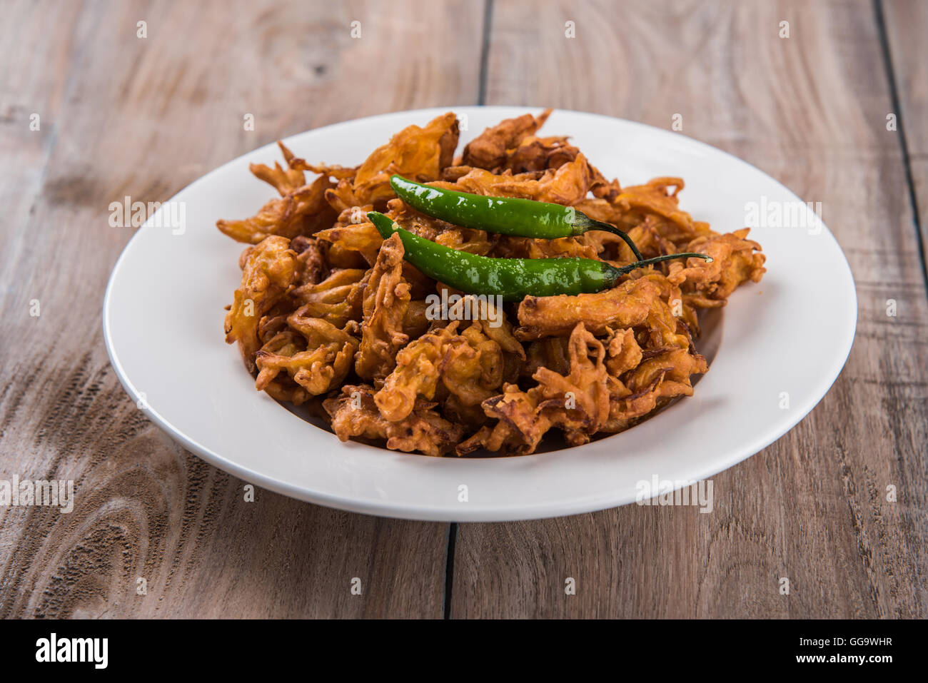 Crispy onion bhaji or kanda bhaji or fried onion pakore or pakode ...