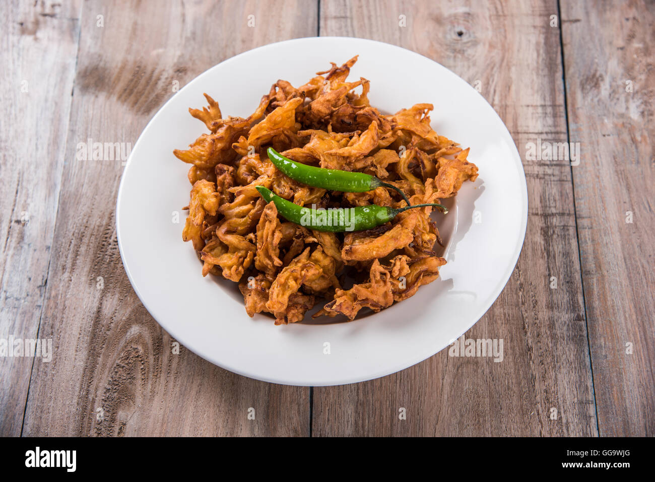 Crispy onion bhaji or kanda bhaji or fried onion pakore or pakode ...