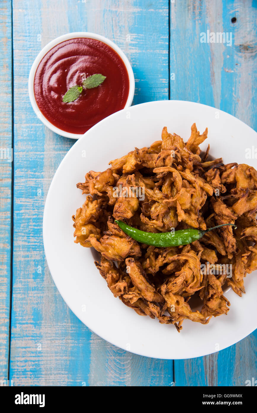 Crispy onion bhaji or kanda bhaji or fried onion pakore or pakode ...