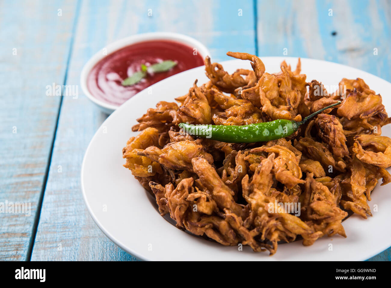 Crispy onion bhaji or kanda bhaji or fried onion pakore or pakode ...