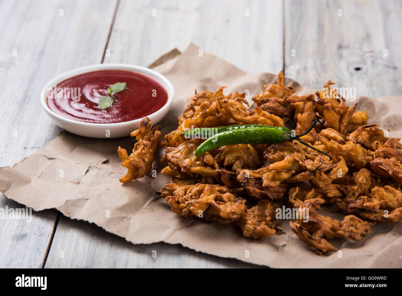 Crispy onion bhaji or kanda bhaji or fried onion pakore or pakode ...