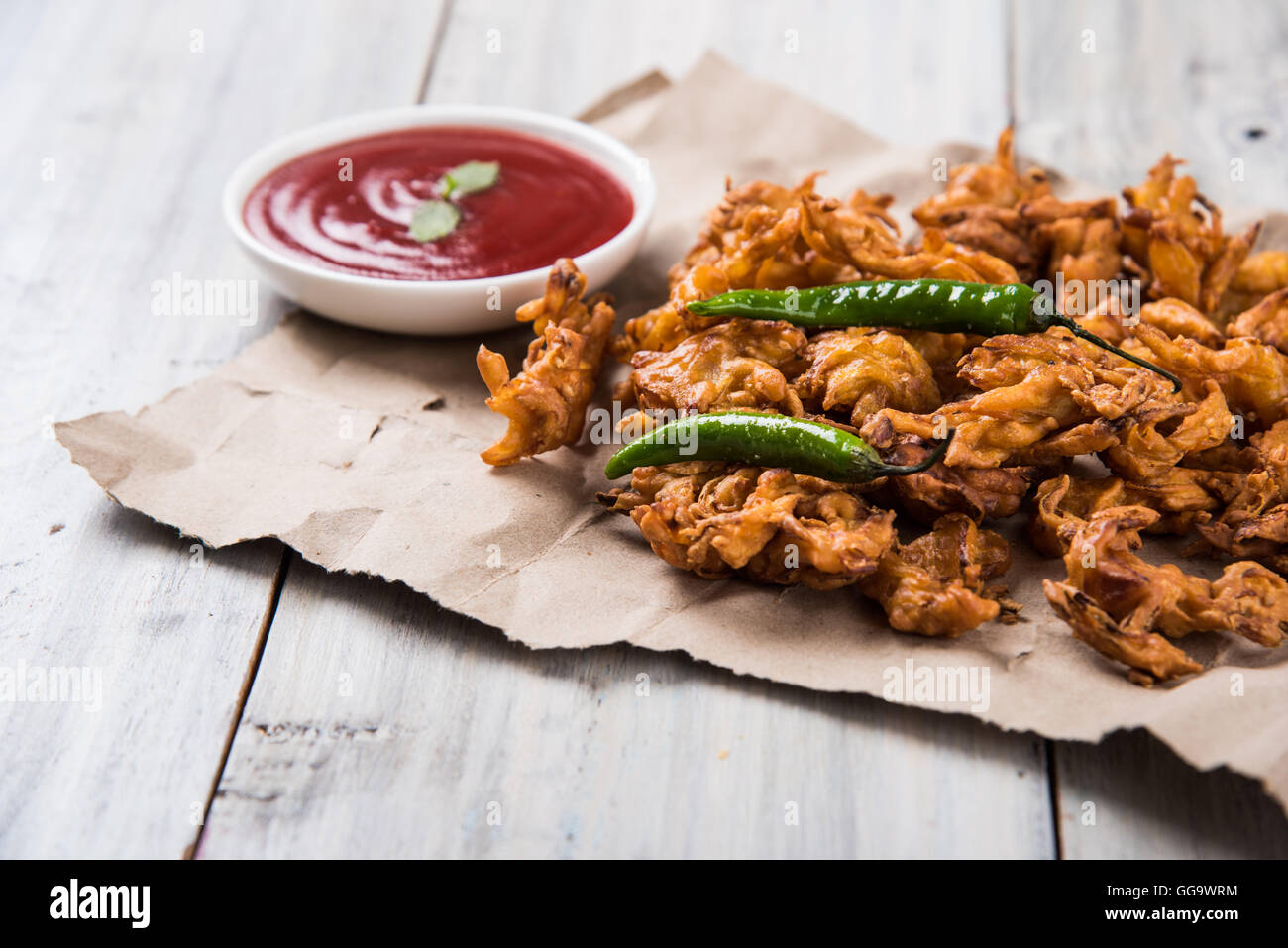 Crispy onion bhaji or kanda bhaji or fried onion pakore or pakode ...