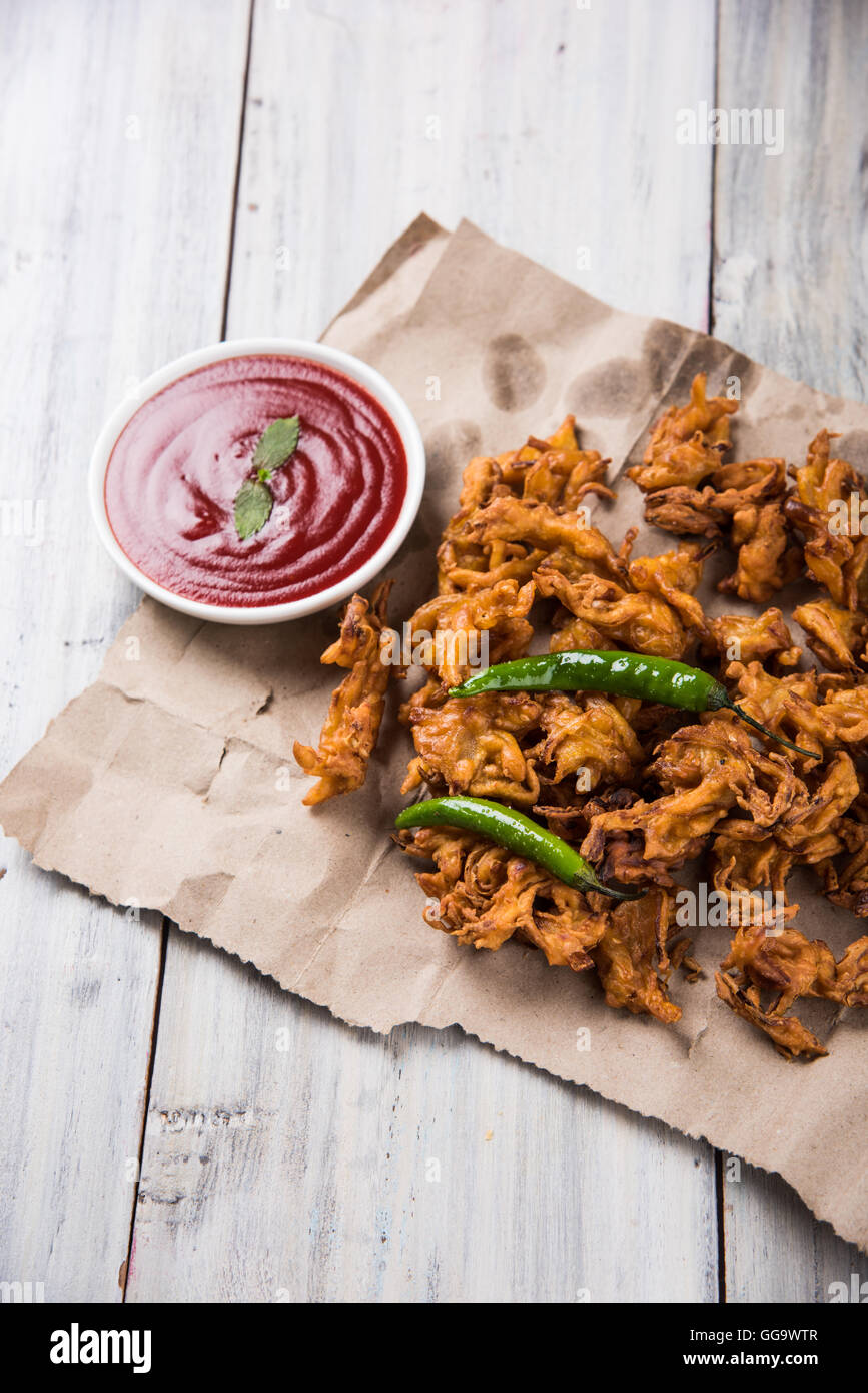 Crispy onion bhaji or kanda bhaji or fried onion pakore or pakode ...