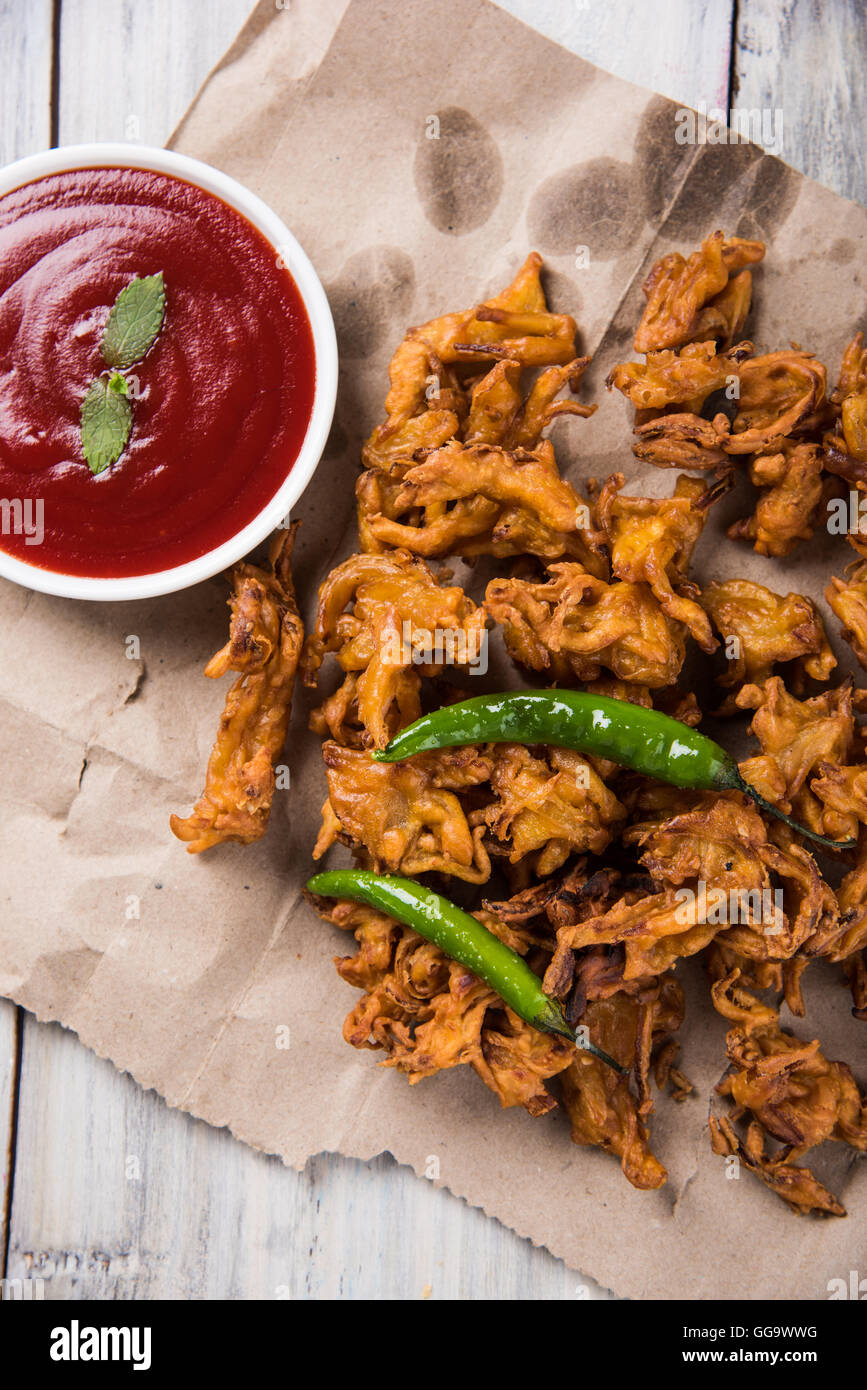 Crispy onion bhaji or kanda bhaji or fried onion pakore or pakode ...
