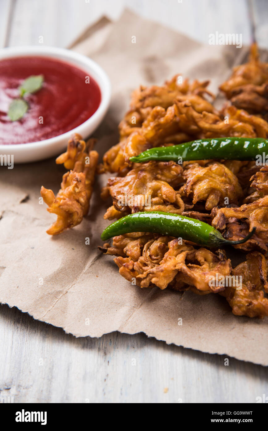 Crispy onion bhaji or kanda bhaji or fried onion pakore or pakode ...