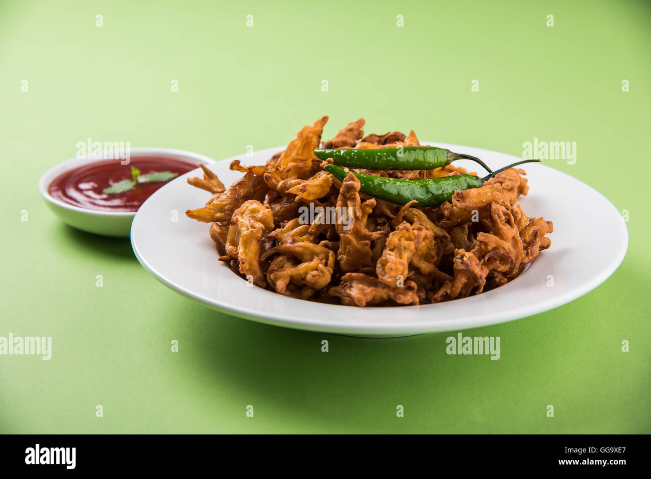 Crispy onion bhaji or kanda bhaji or fried onion pakore or pakode ...