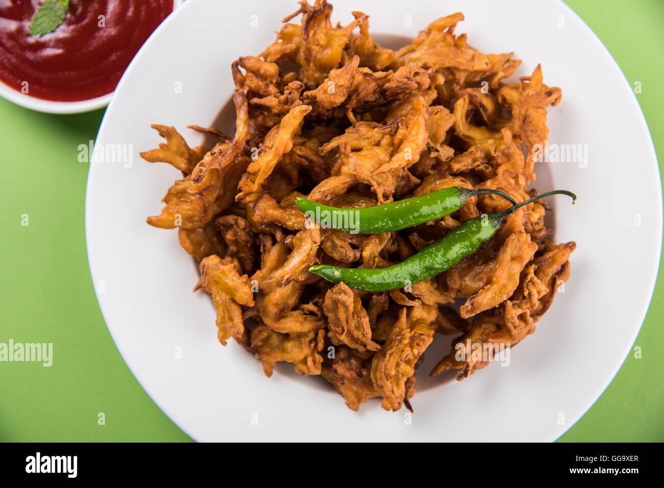 Crispy onion bhaji or kanda bhaji or fried onion pakore or pakode ...