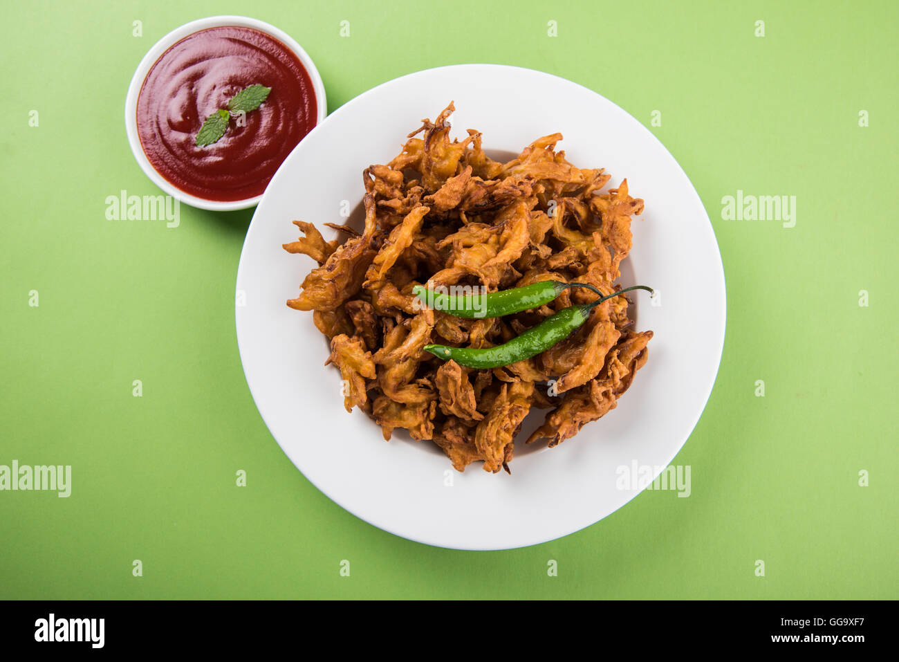 Crispy onion bhaji or kanda bhaji or fried onion pakore or pakode ...