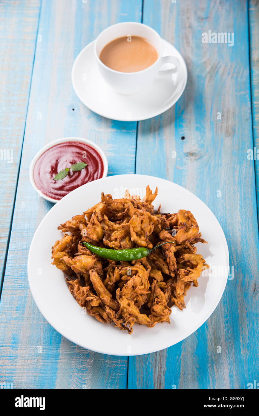 Crispy onion bhaji or kanda bhaji or fried onion pakore or pakode ...