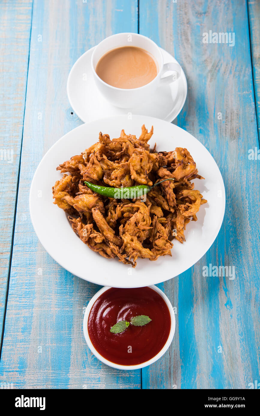 Crispy onion bhaji or kanda bhaji or fried onion pakore or pakode ...