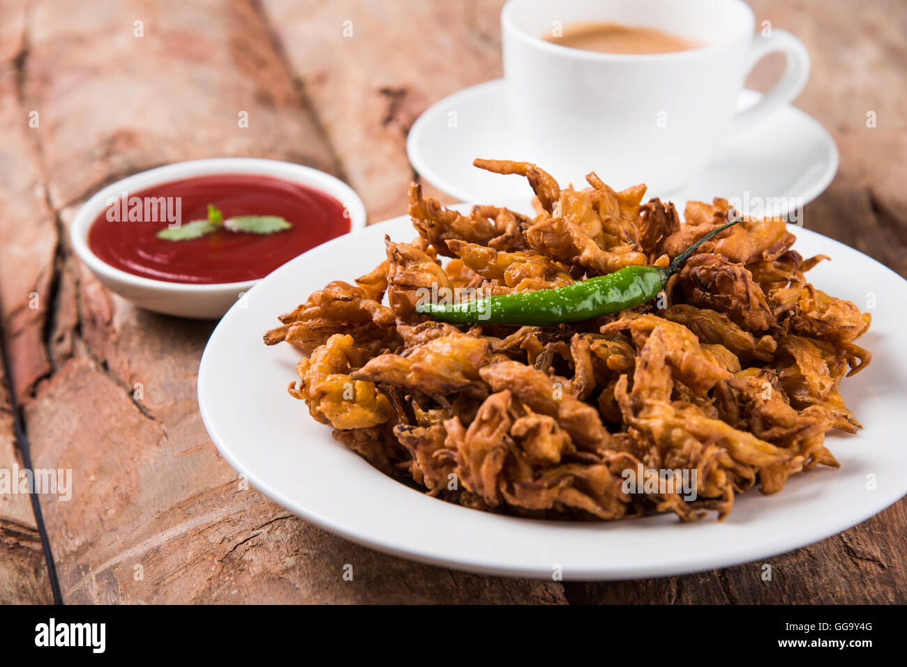 Crispy onion bhaji or kanda bhaji or fried onion pakore or pakode ...