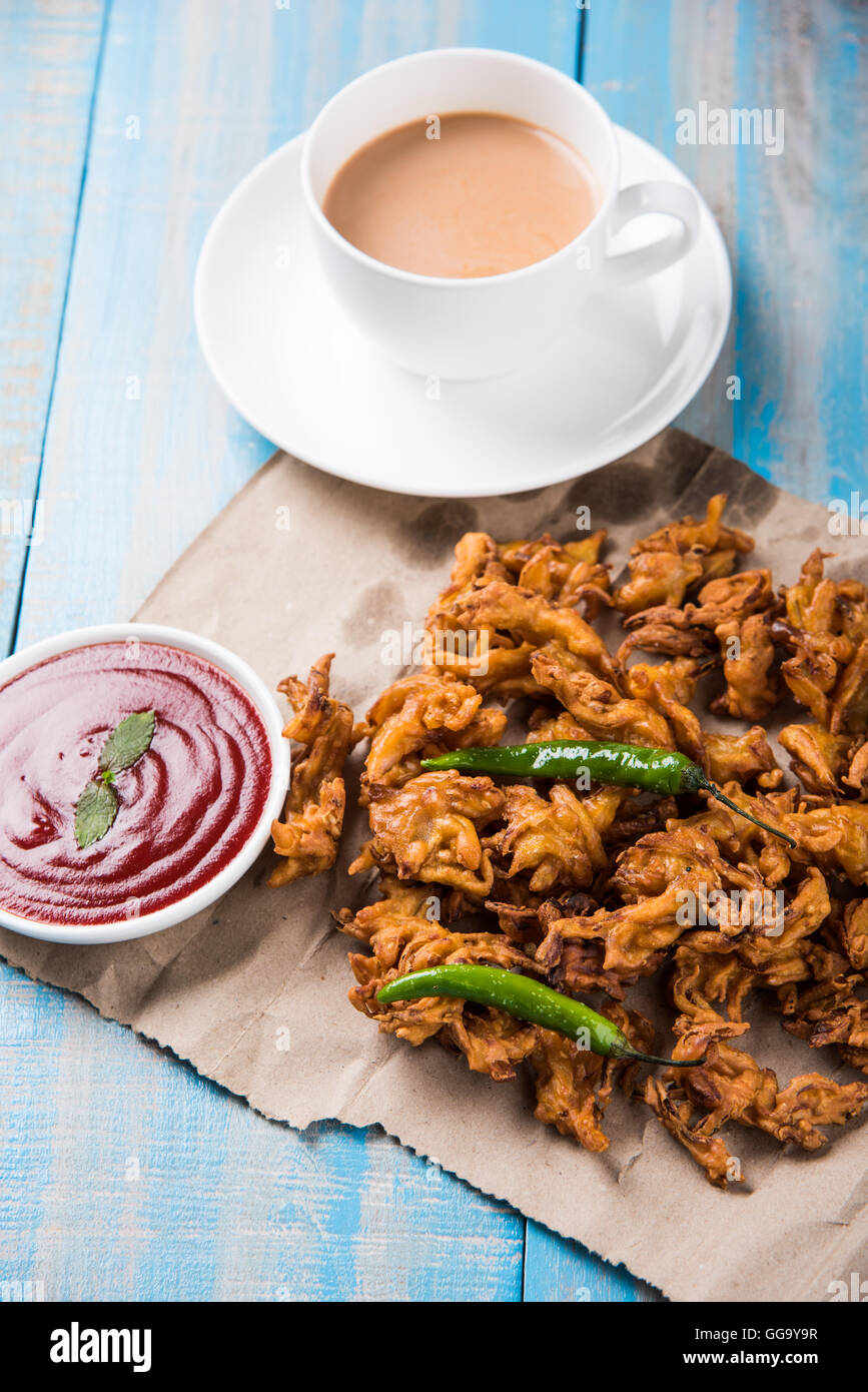 Crispy onion bhaji or kanda bhaji or fried onion pakore or pakode ...