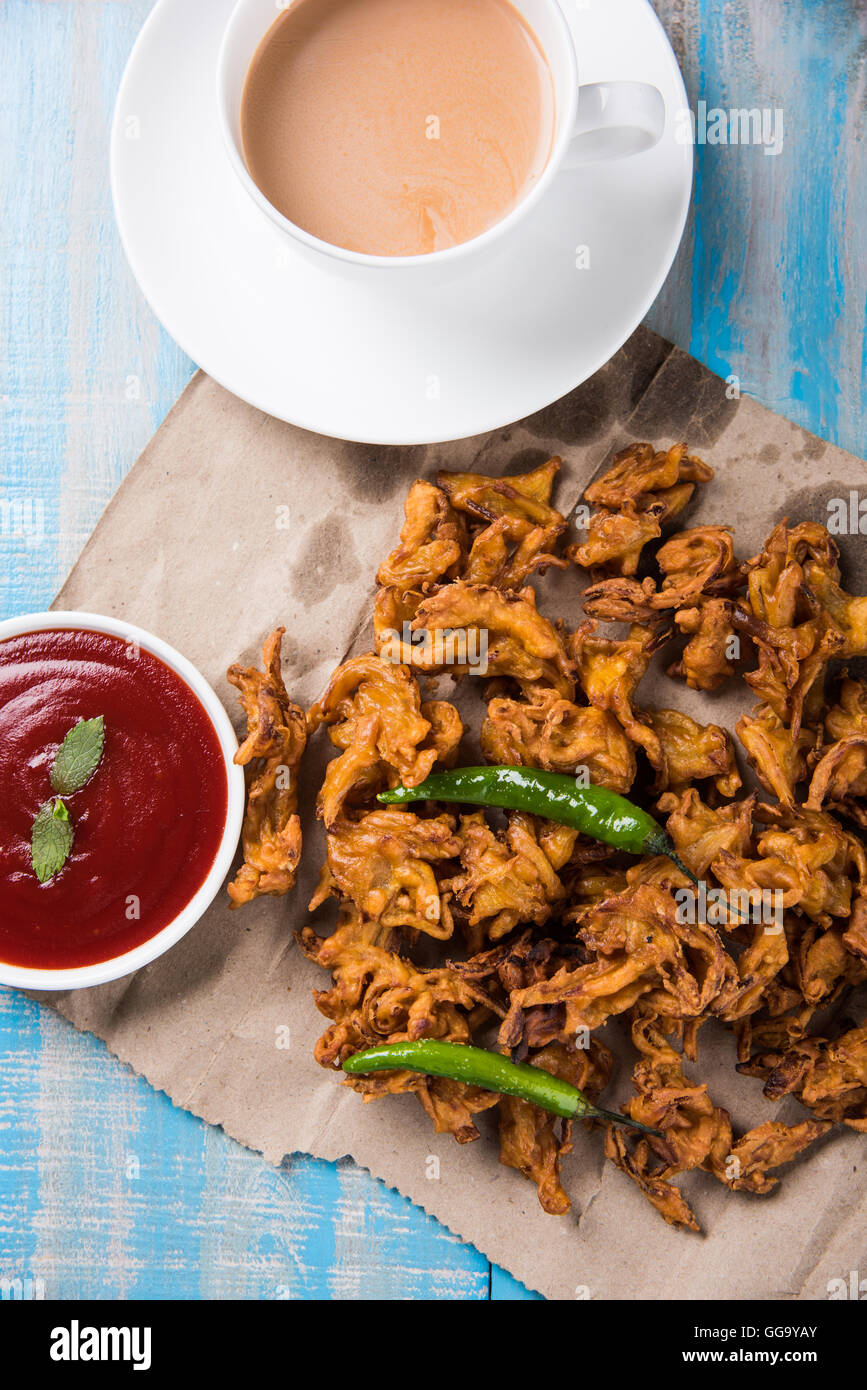 Crispy onion bhaji or kanda bhaji or fried onion pakore or pakode ...