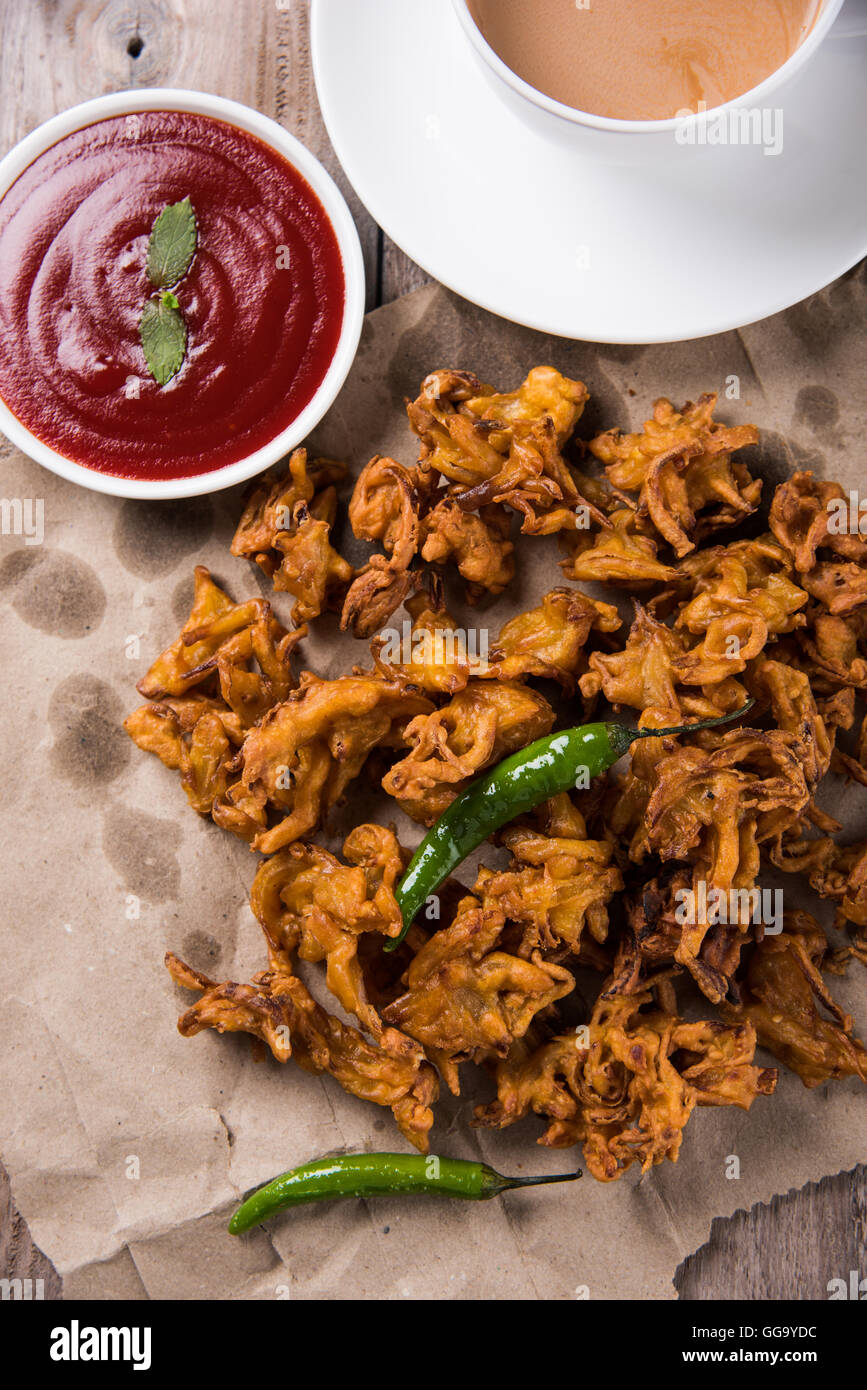 Crispy onion bhaji or kanda bhaji or fried onion pakore or pakode ...
