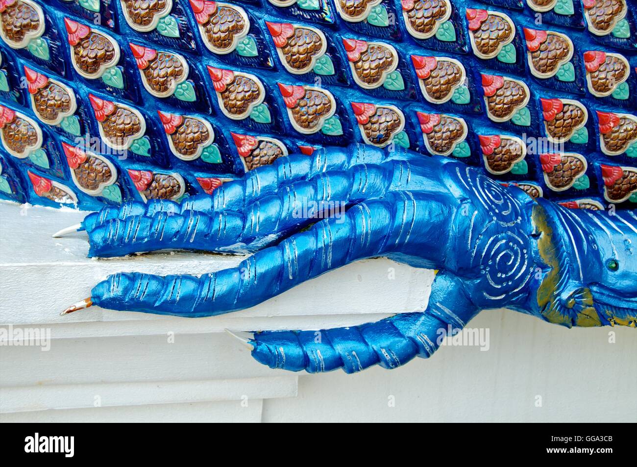 Foot of mythical creature guarding entrance to Wat Ban Den, near Chiang ...