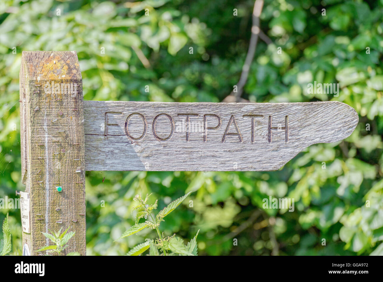 Footpath sign in a rural village Stock Photo - Alamy