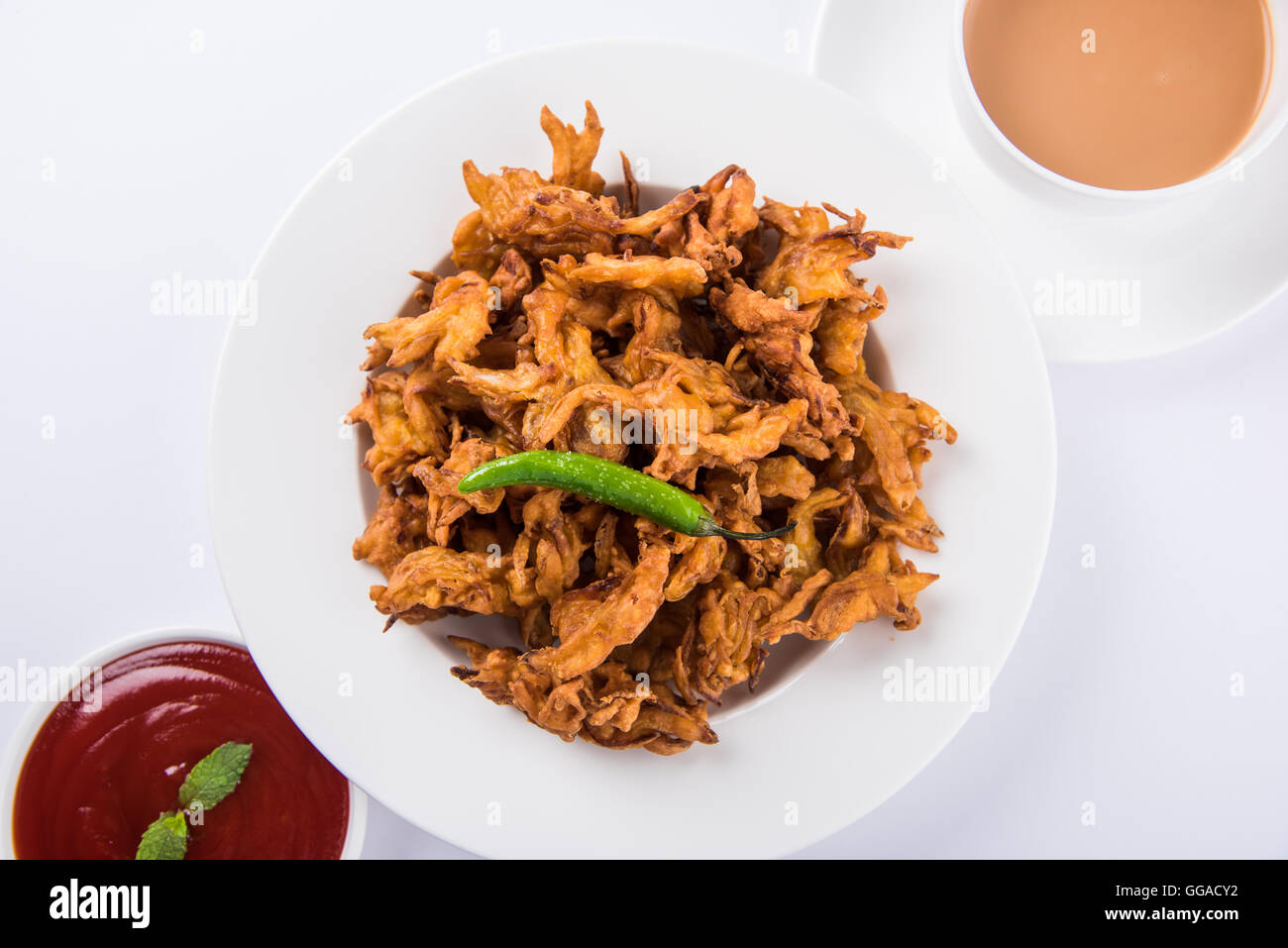 Crispy onion bhaji or kanda bhaji or fried onion pakore or pakode ...