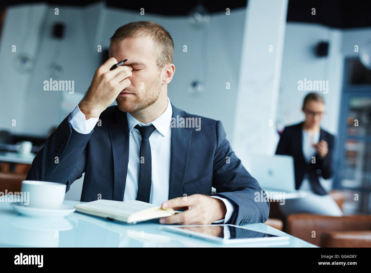 Depressed businessman corporate office hi-res stock photography and ...
