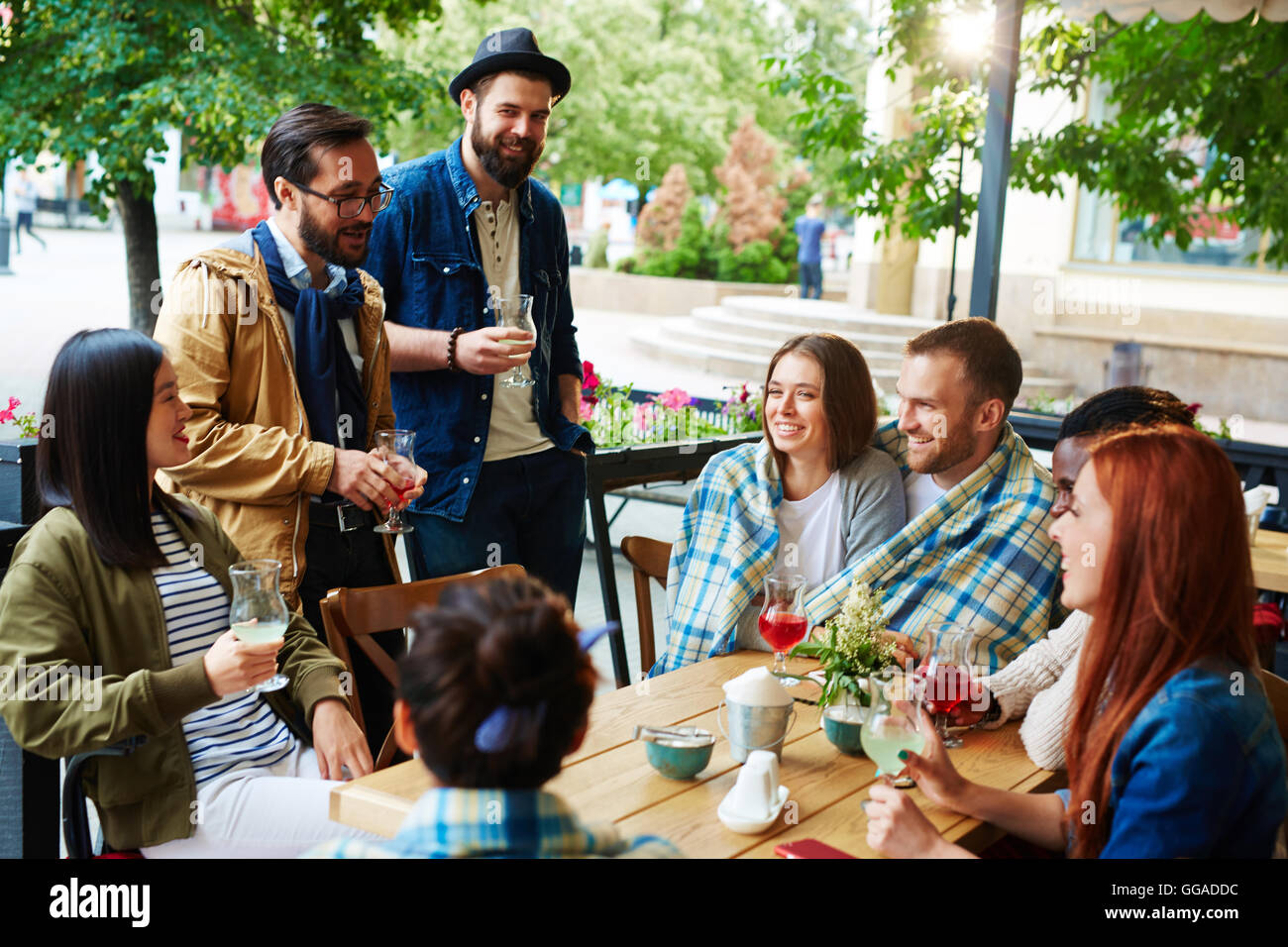 Friends at cafe Stock Photo - Alamy