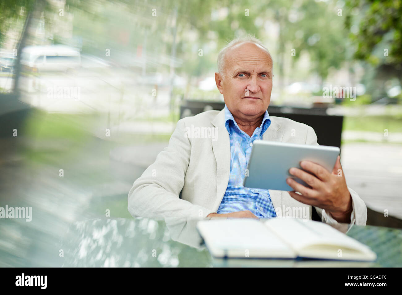 Man with touchpad Stock Photo - Alamy