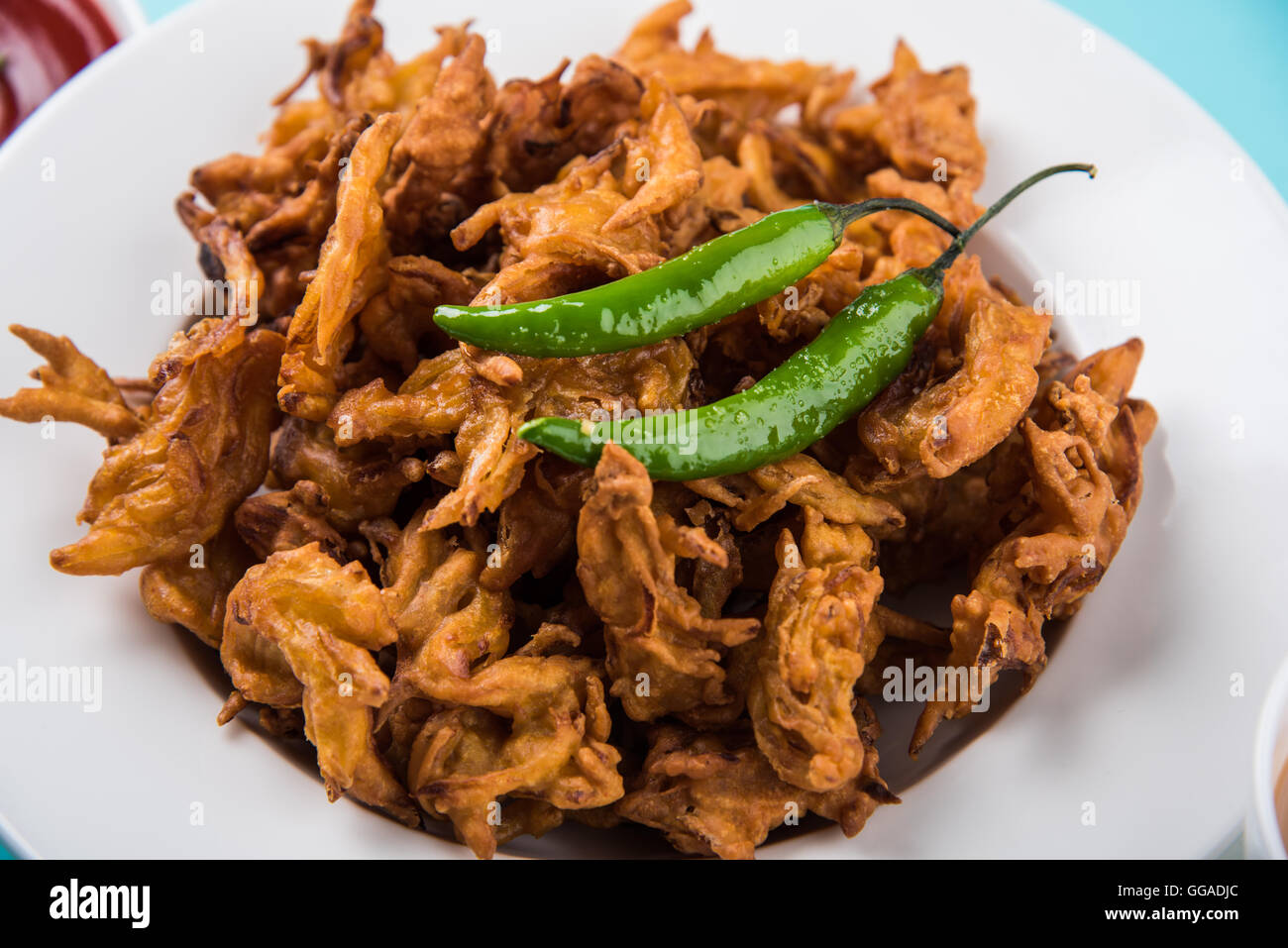 Crispy onion bhaji or kanda bhaji or fried onion pakore or pakode ...