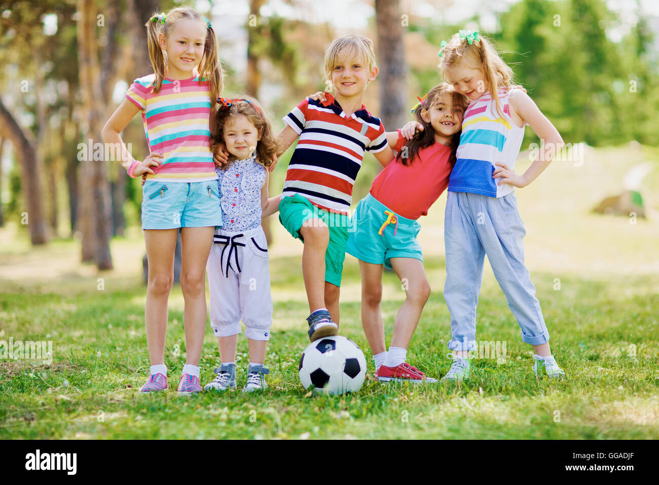 Football girl and boy hi-res stock photography and images - Alamy
