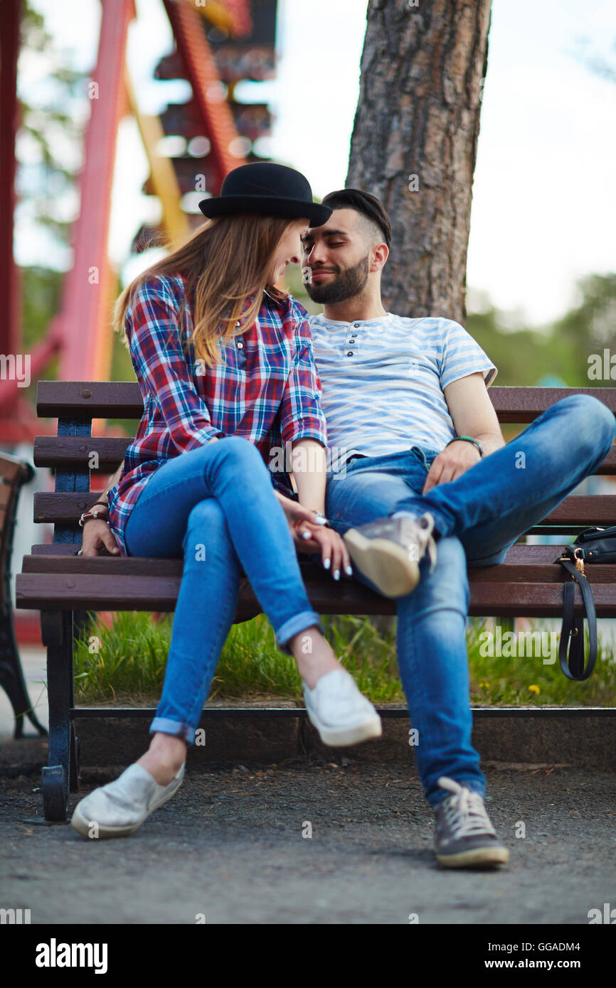 Couple young man sitting hi-res stock photography and images - Alamy