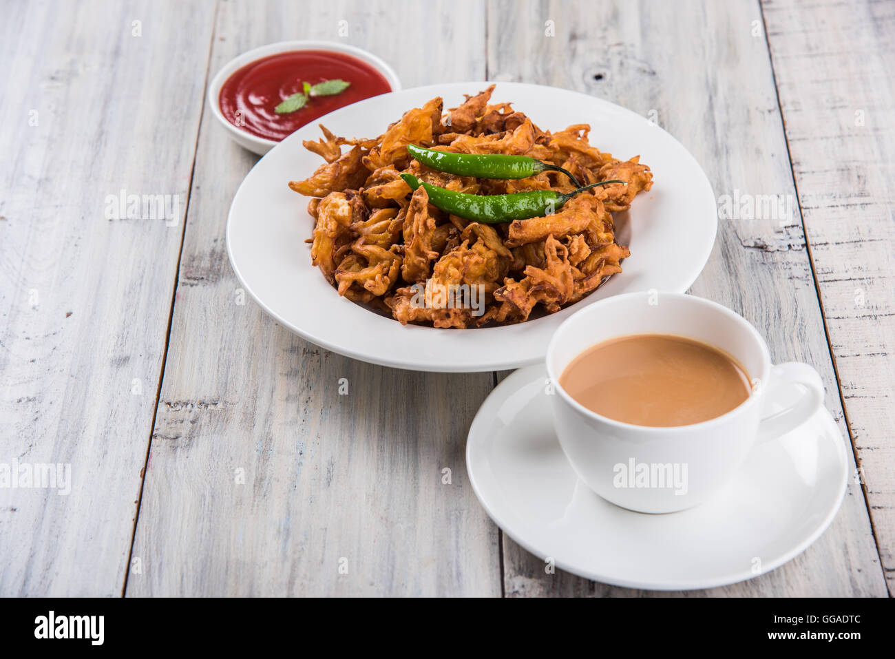 Crispy onion bhaji or kanda bhaji or fried onion pakore or pakode ...