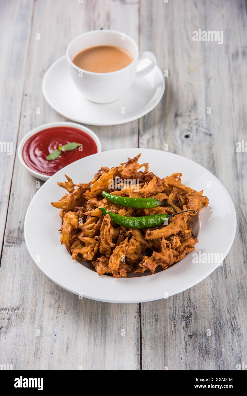 Crispy onion bhaji or kanda bhaji or fried onion pakore or pakode ...