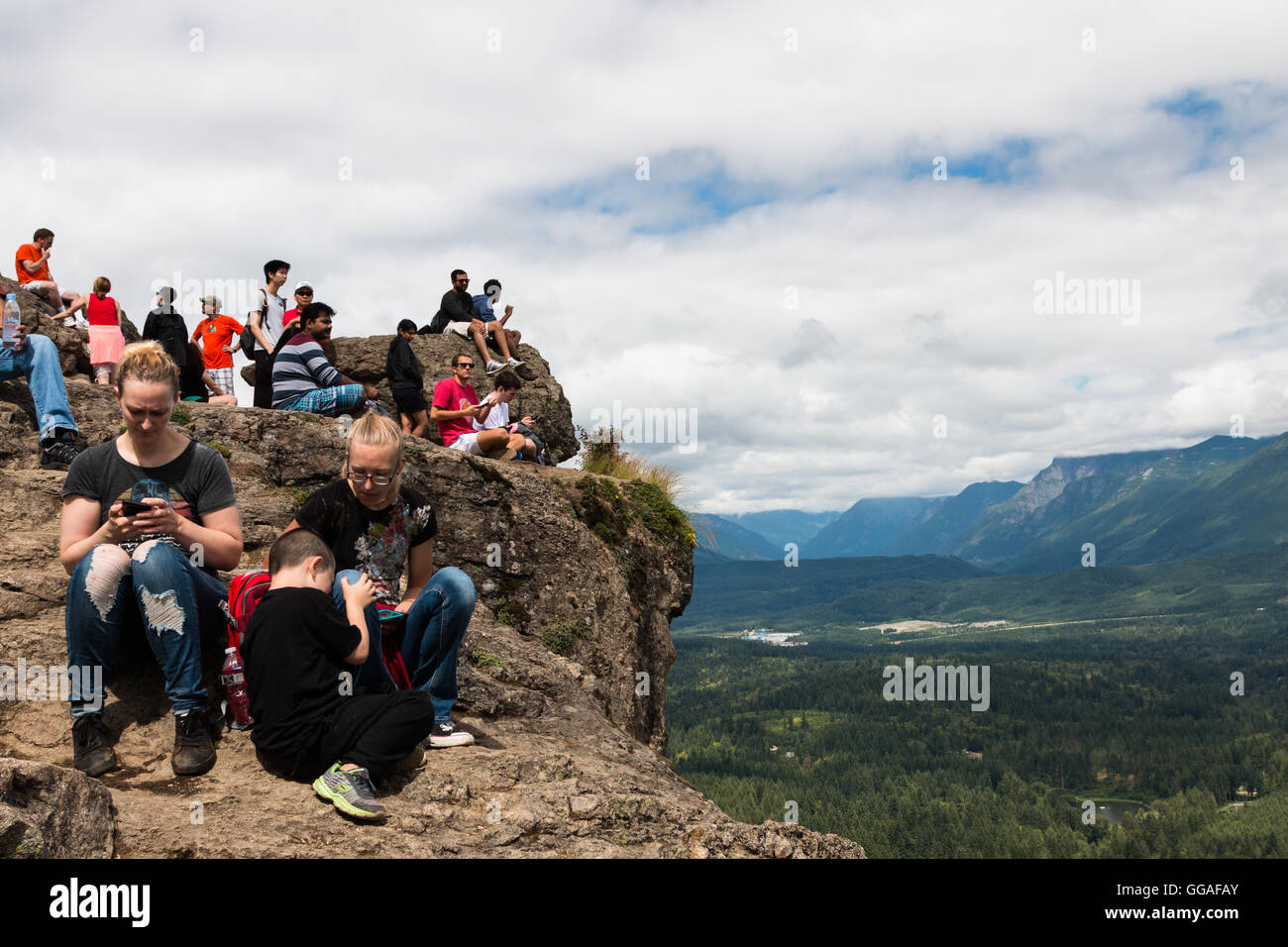 People sit mobile phones hi-res stock photography and images - Alamy