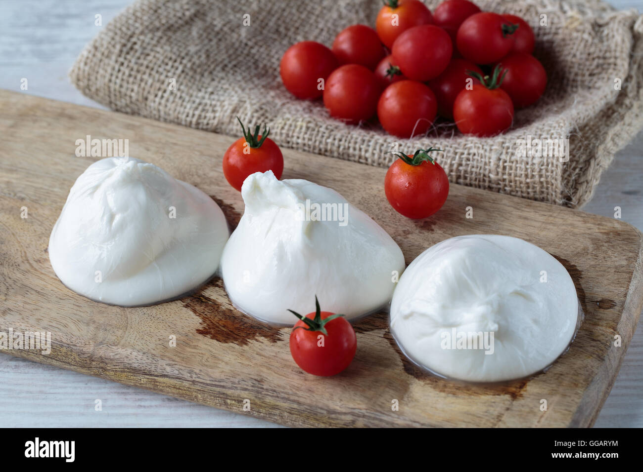 Fresh delicious burrata cheese typical from Apulia region, Italy Stock ...
