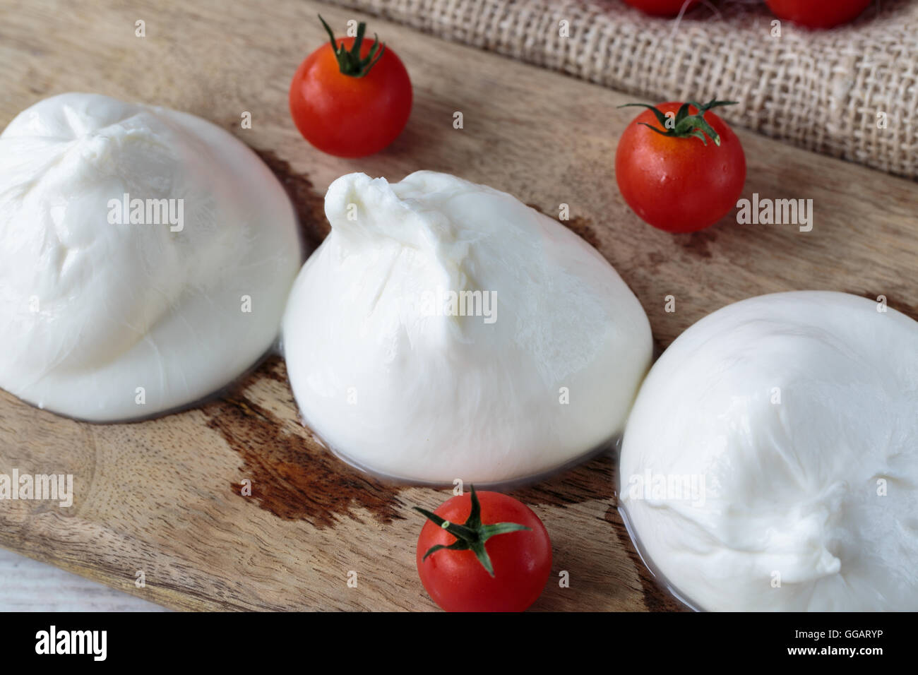 Fresh delicious burrata cheese typical from Apulia region, Italy Stock ...