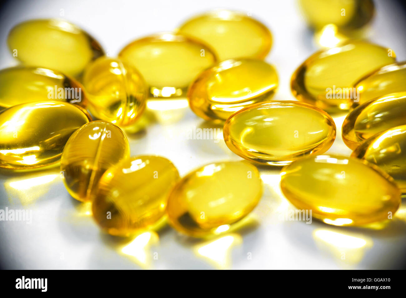 Gold capsules hi-res stock photography and images - Alamy