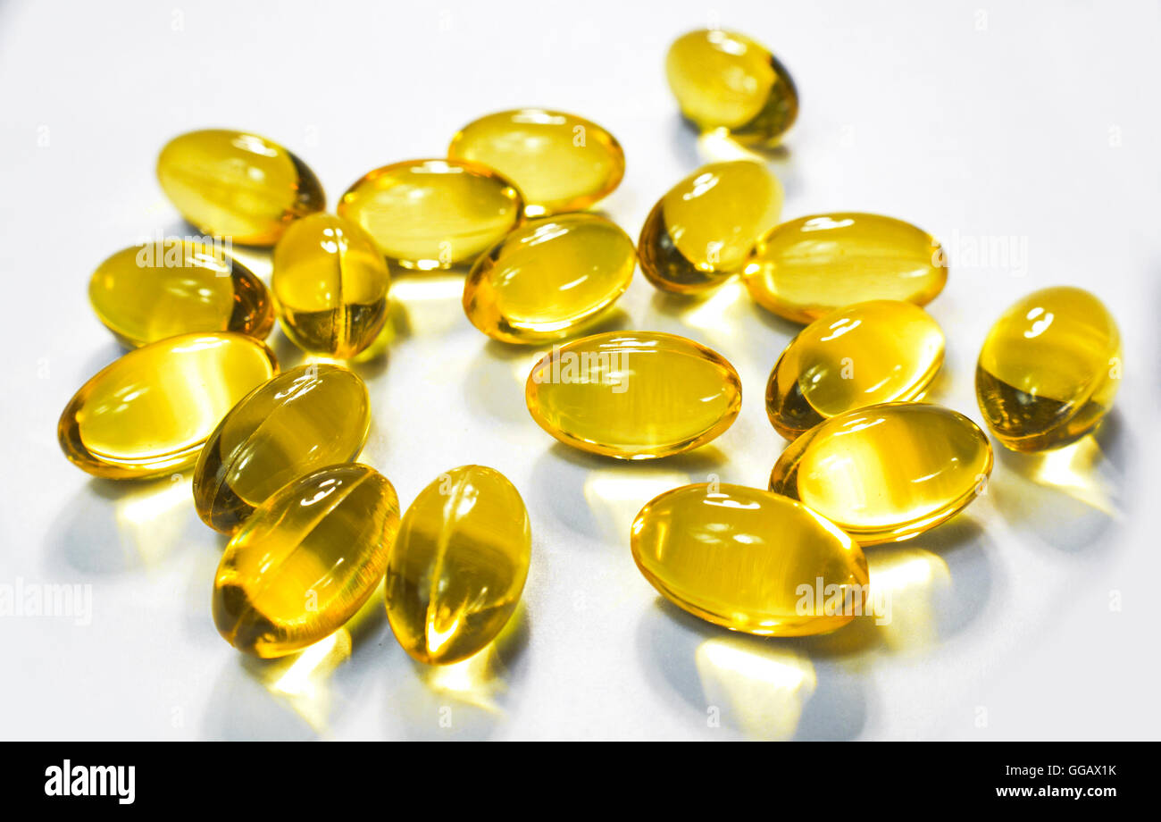 Gold capsules hi-res stock photography and images - Alamy