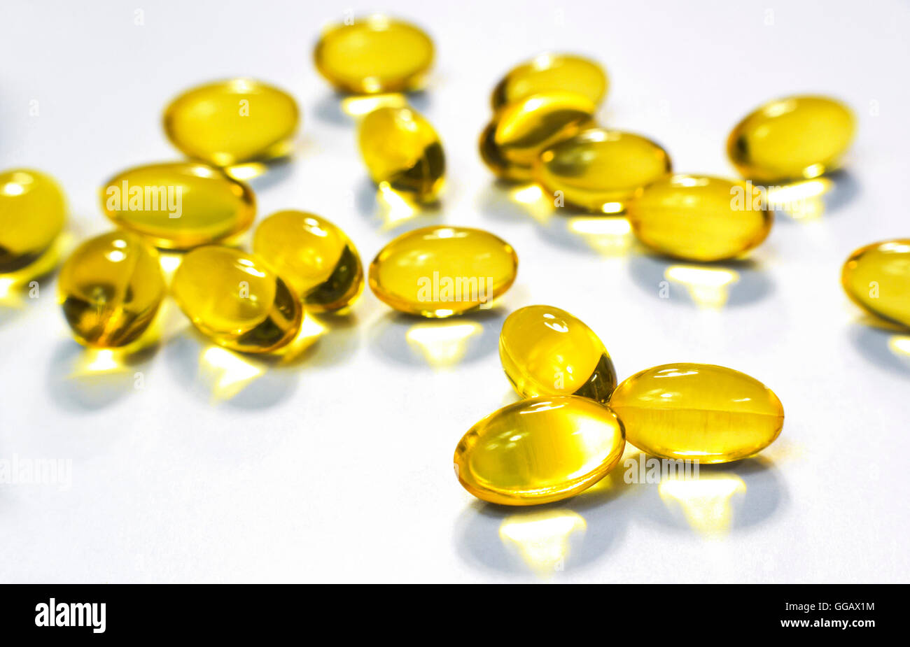 Gold capsules hi-res stock photography and images - Alamy