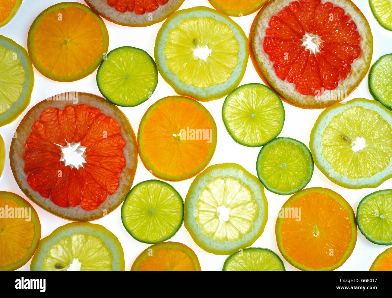Background of some various colorful citrus slices Stock Photo - Alamy