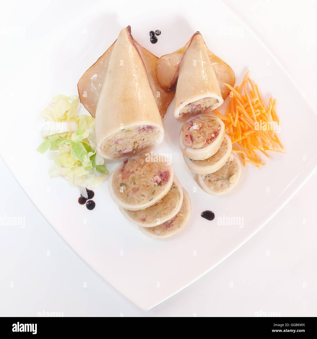 Squid stuffed with prepared stuffing and baked. photographed in the ...