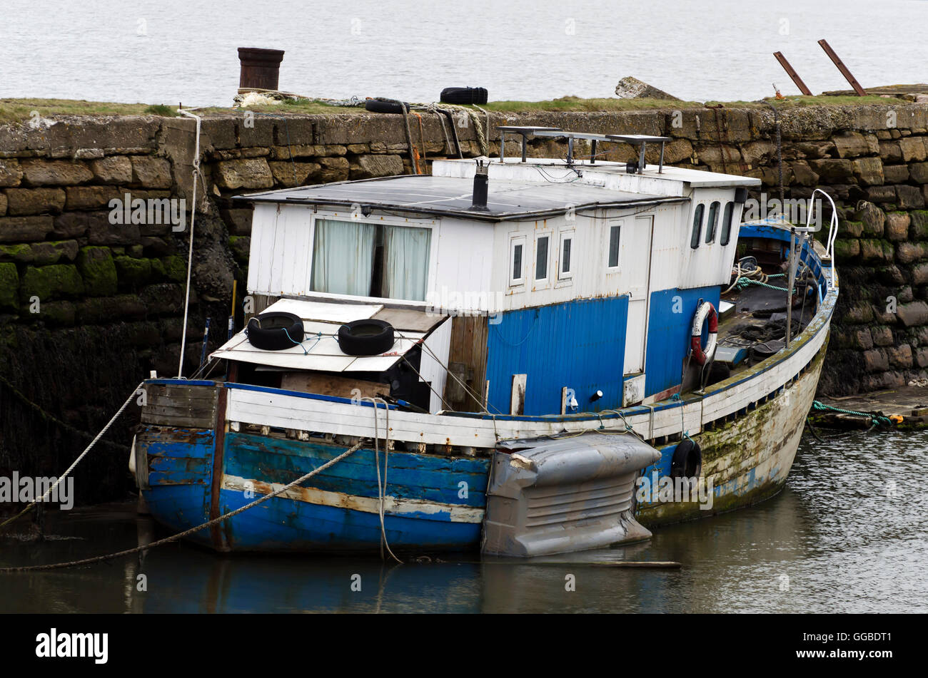 Old neglected boat in Charlestown Harbour in Fife, Scotland Stock Photo ...
