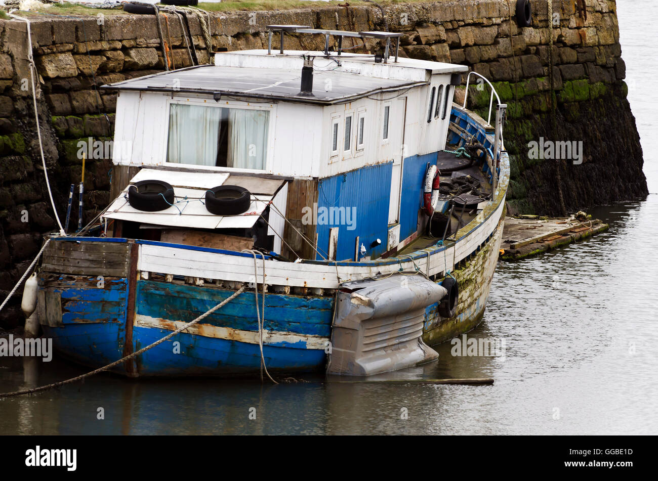 Old neglected boat in Charlestown Harbour in Fife, Scotland Stock Photo ...