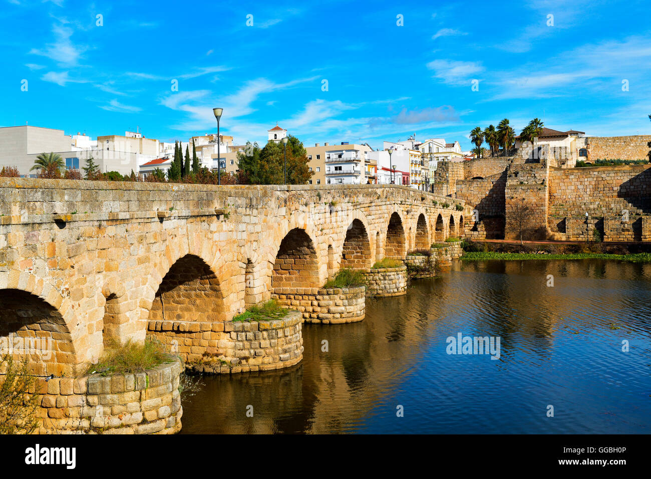 a view of the Puente Romano, an ancient Roman bridge over the Guadiana ...