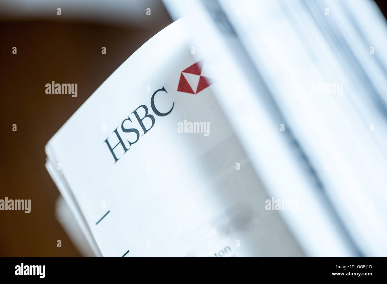 Signage and cheque books with logo from HSBC Bank Stock Photo - Alamy