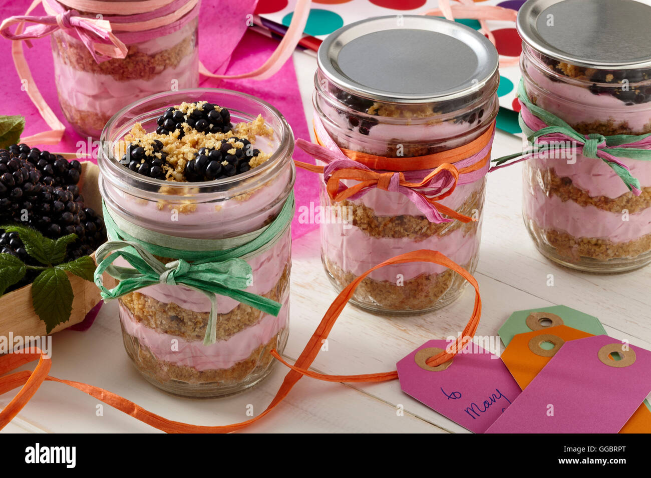 Blackberry cheesecake parfait jars Stock Photo - Alamy