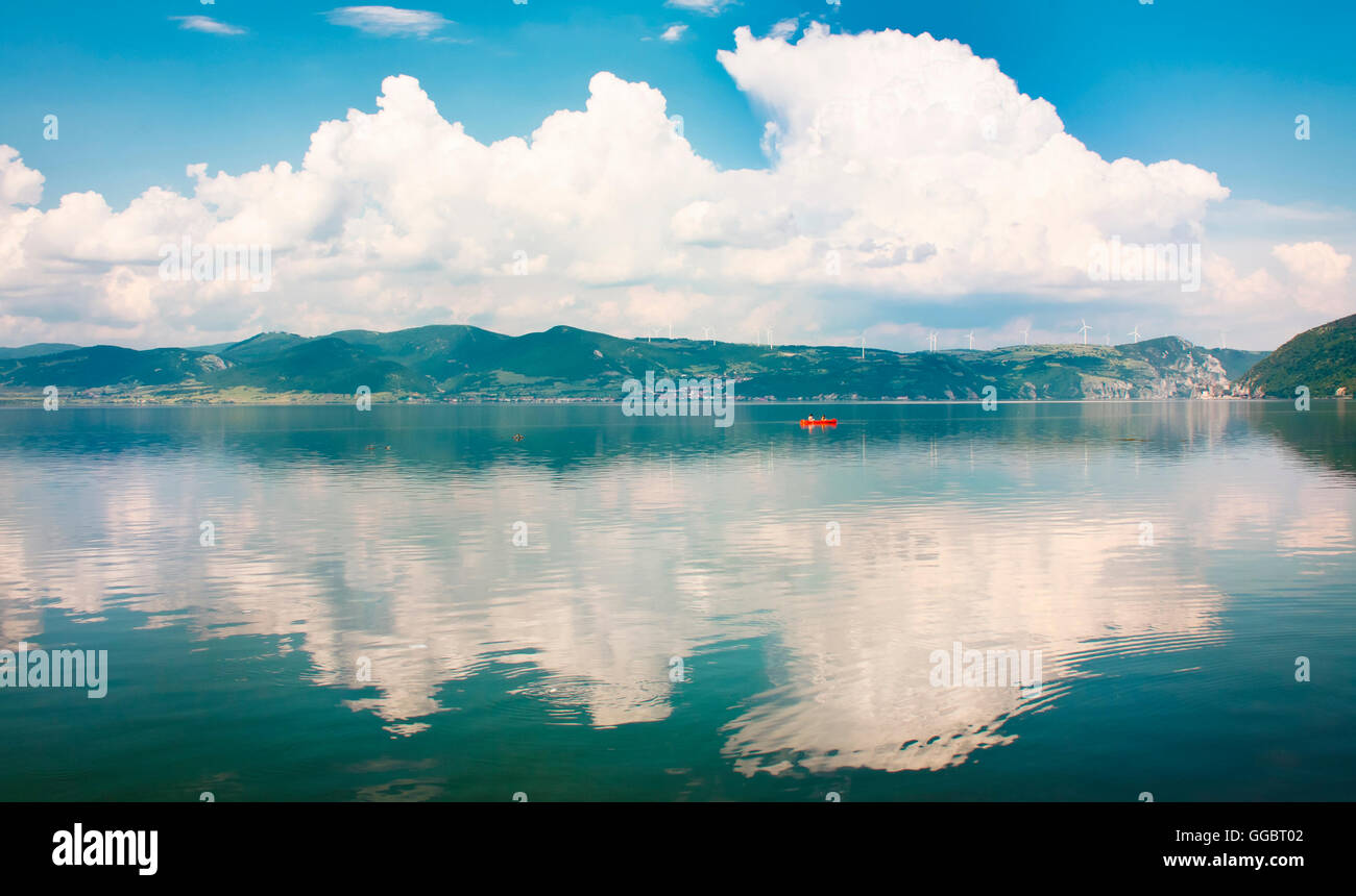 On the beautiful blue Danube: Clouds reflecting in the waters of the ...